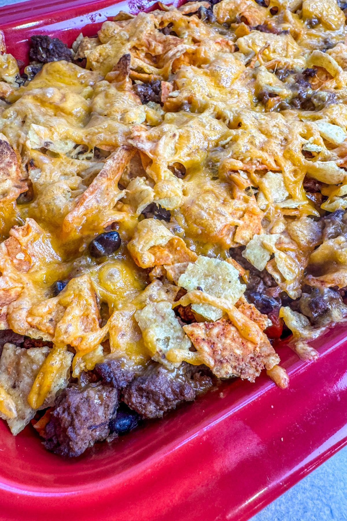 Supreme Walking Taco Casserole - Laughing Rooster Eats