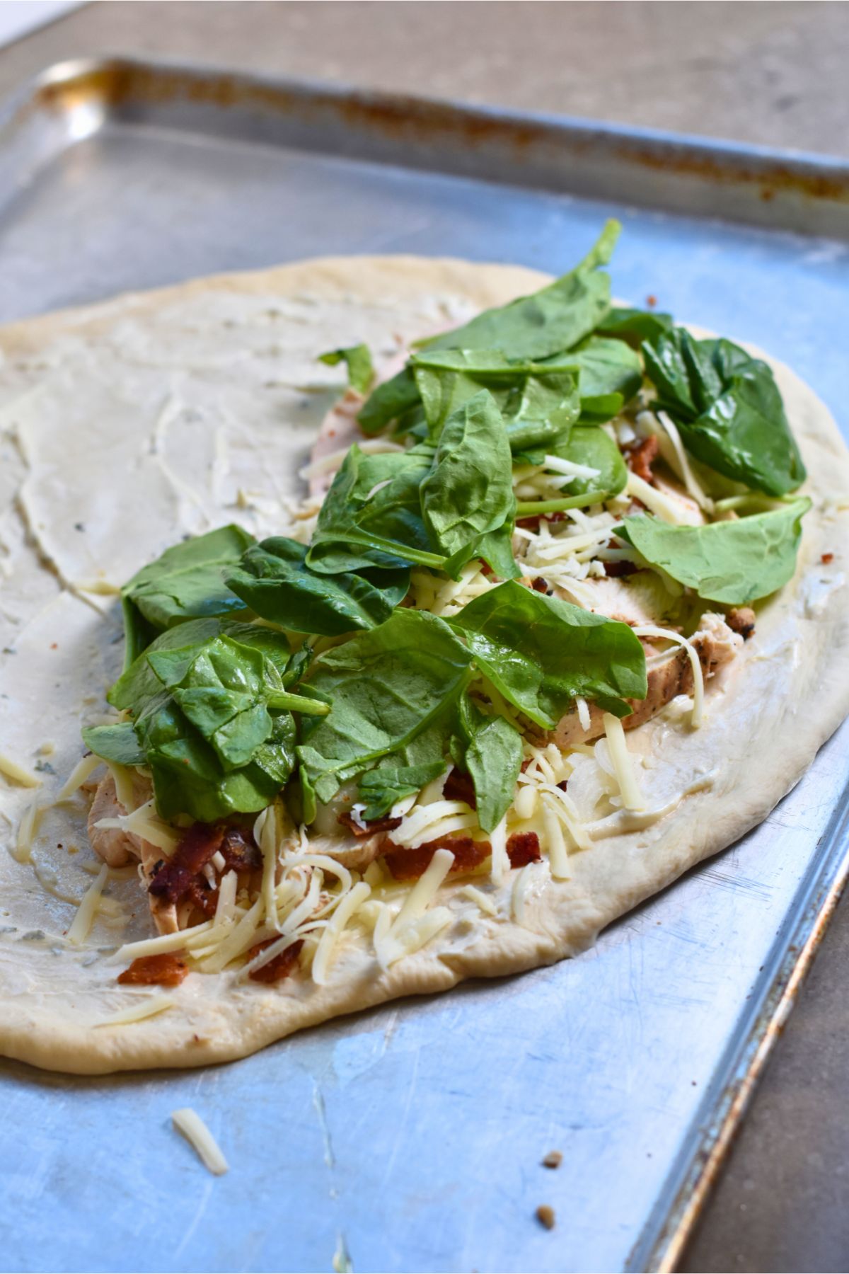 Chicken Bacon Ranch Calzone Recipe - Laughing Rooster Eats